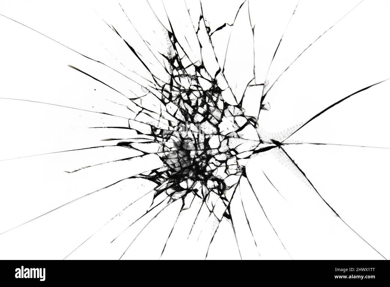 Broken glass. A split in a transparent window. Glass cracks on a white ...