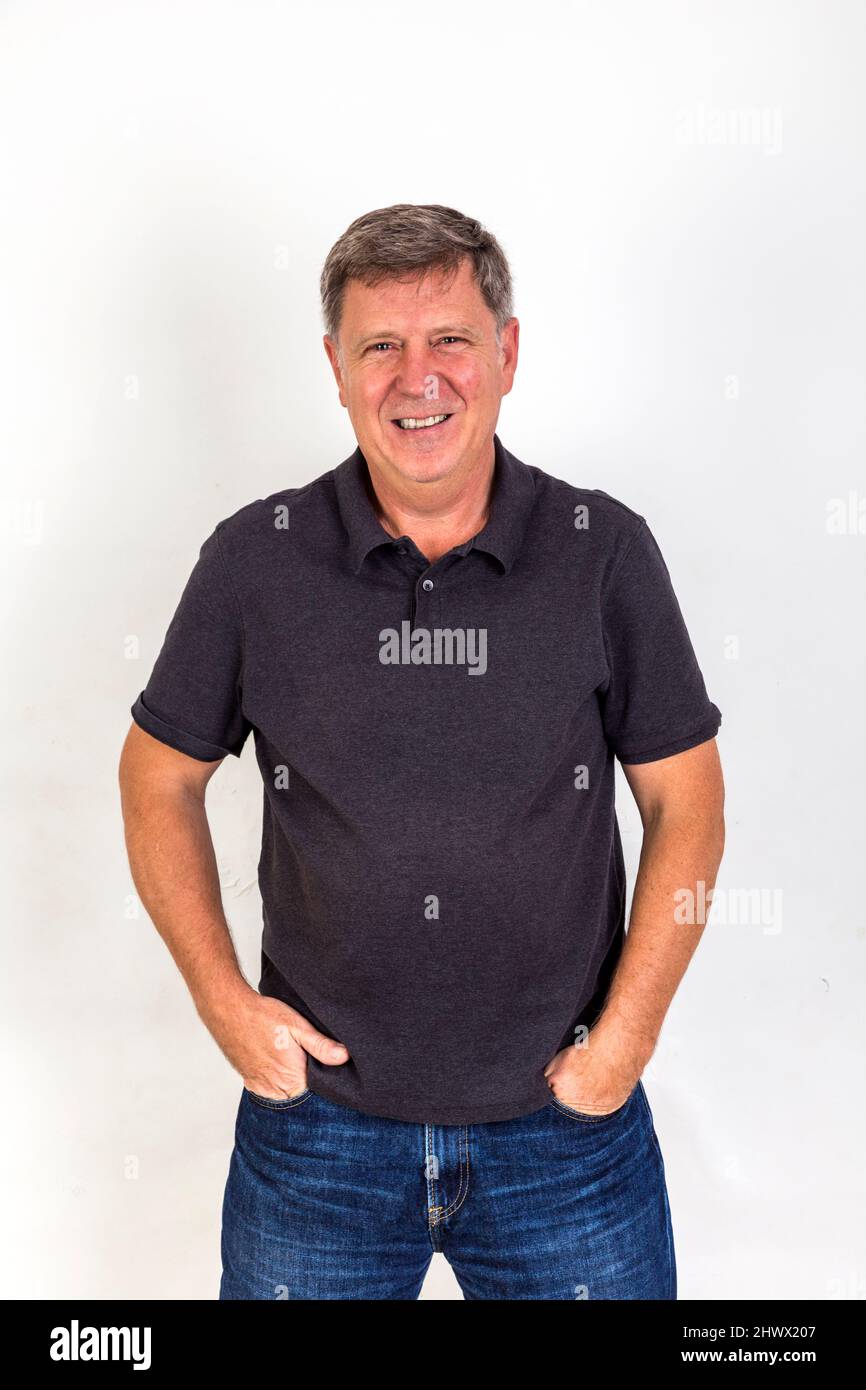 portrait of smart friendly looking mature man Stock Photo - Alamy