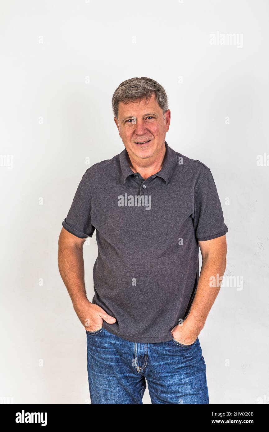 portrait of smart friendly looking mature man Stock Photo - Alamy