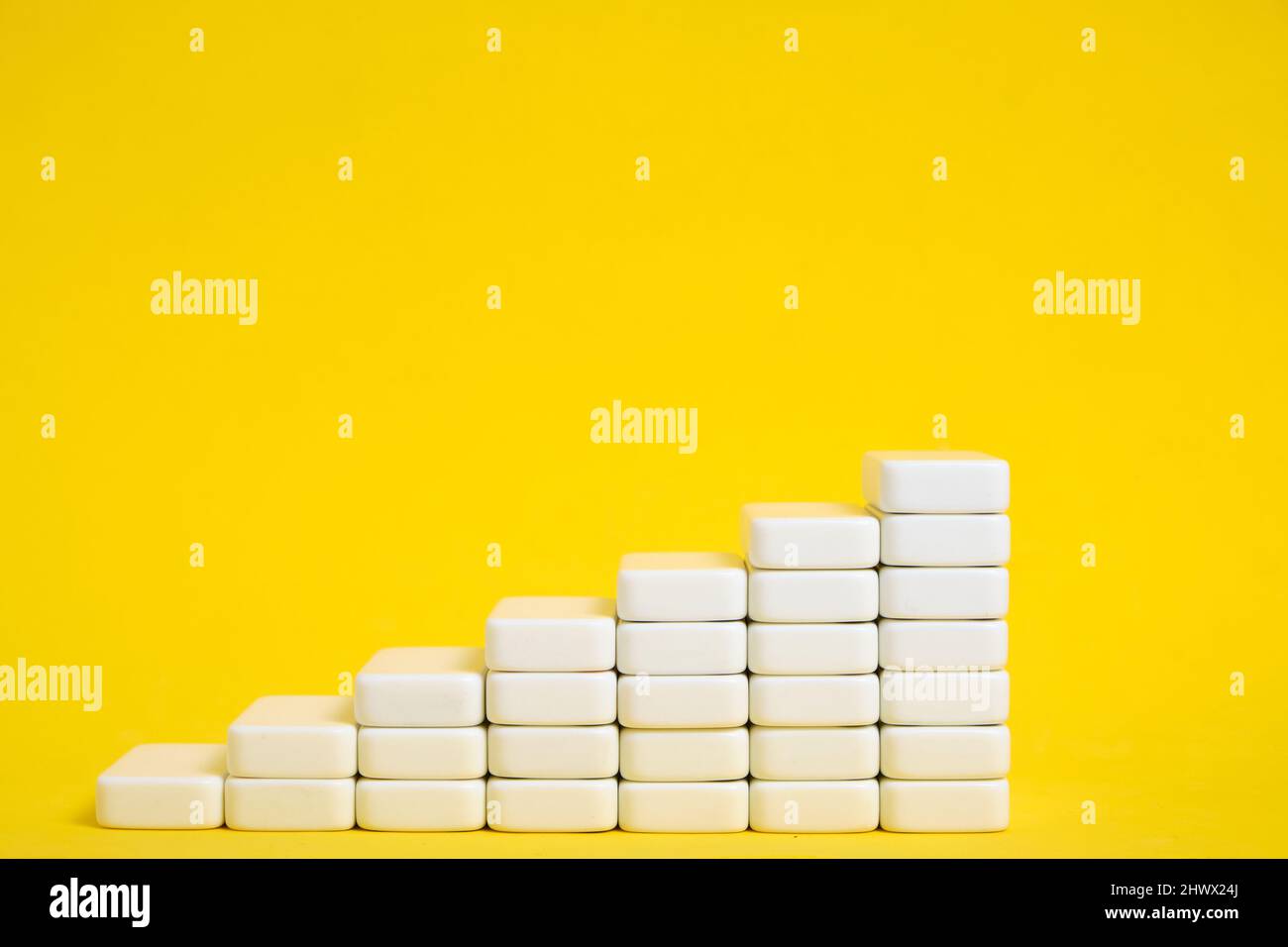 Stairs growing up, growth and rise graph yellow background Stock Photo ...