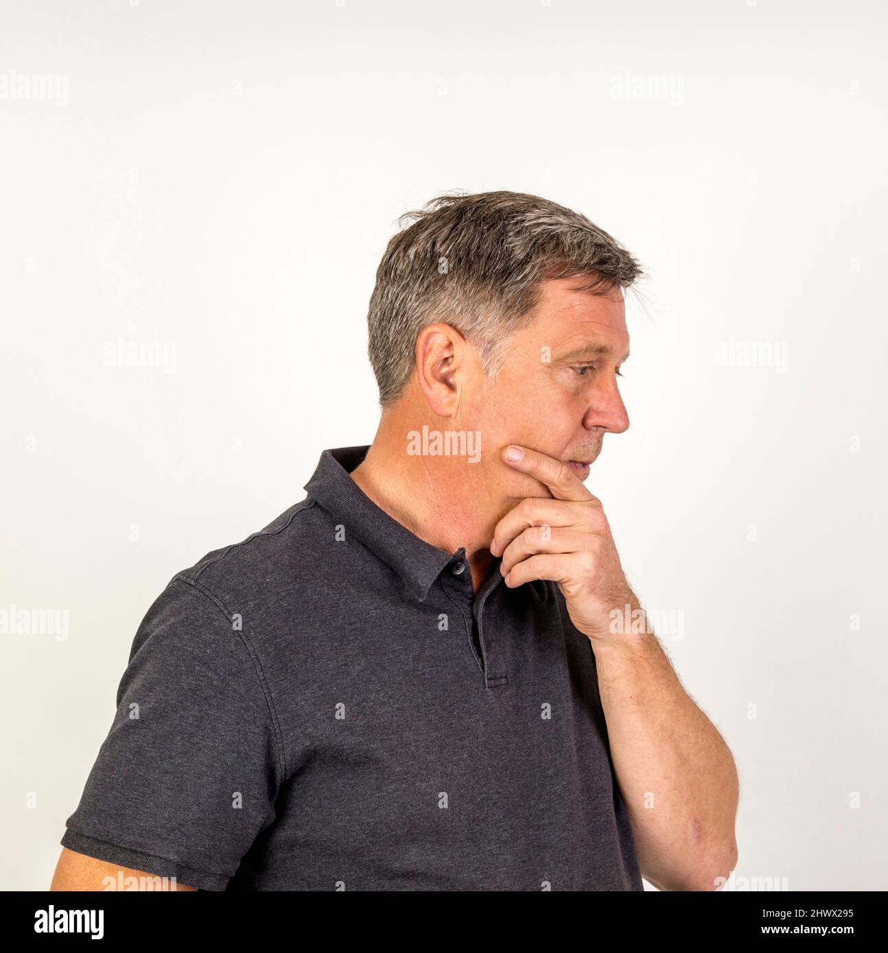 Handsome middle age man studio portrait with white background Stock ...