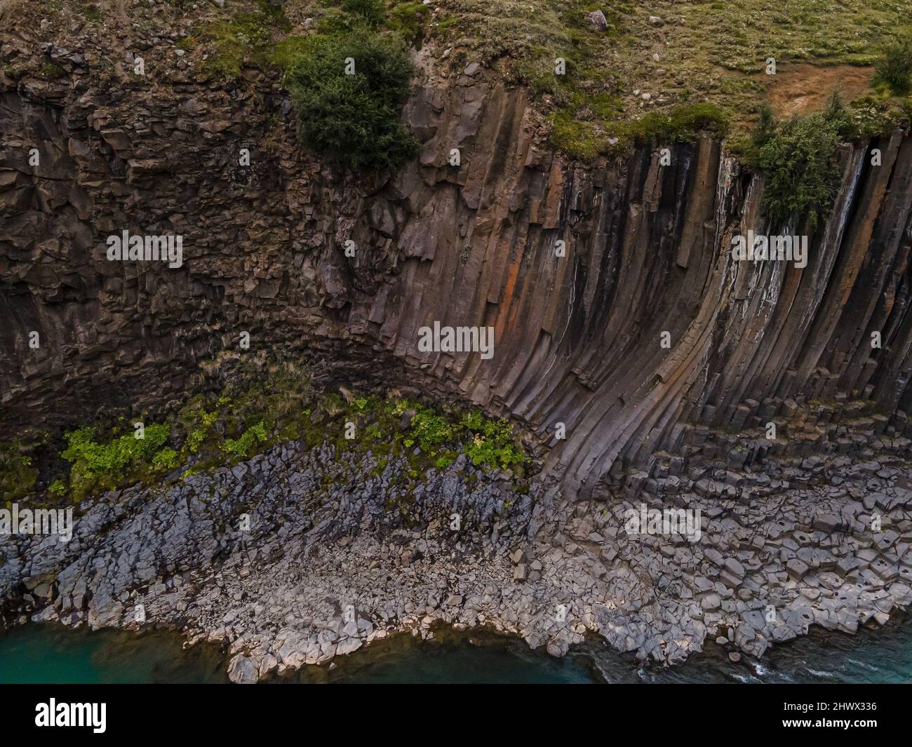 Beautiful aerial view of the studlagil canyon, and the largest number of basalt rock columns in ...