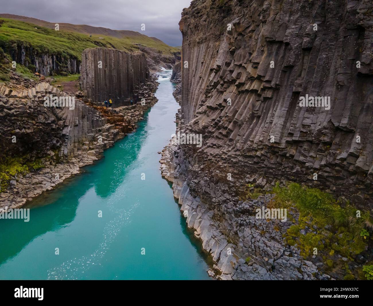 Beautiful aerial view of the studlagil canyon, and the largest number of basalt rock columns in ...