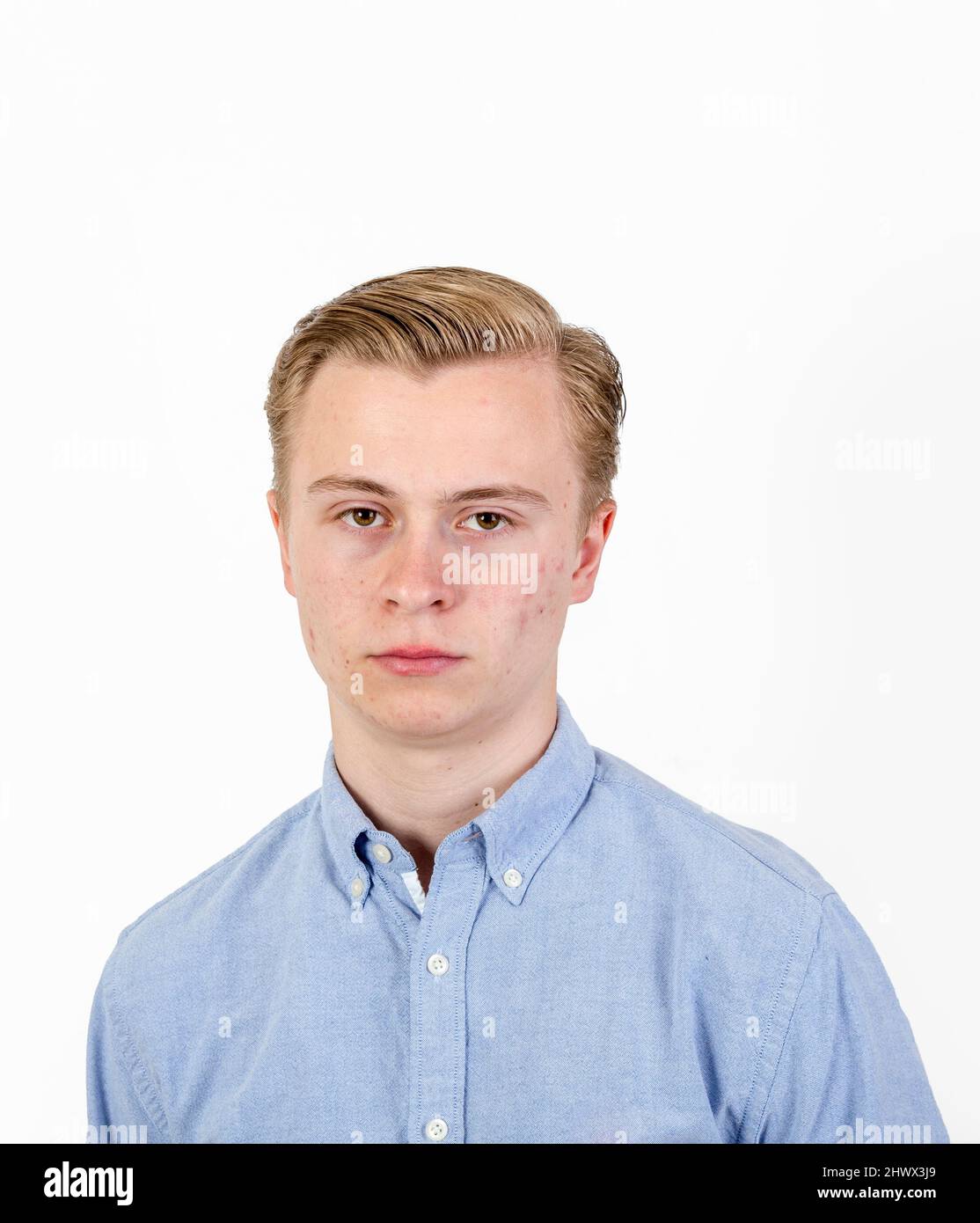 portrait of sad teenage boy with brown hair Stock Photo - Alamy