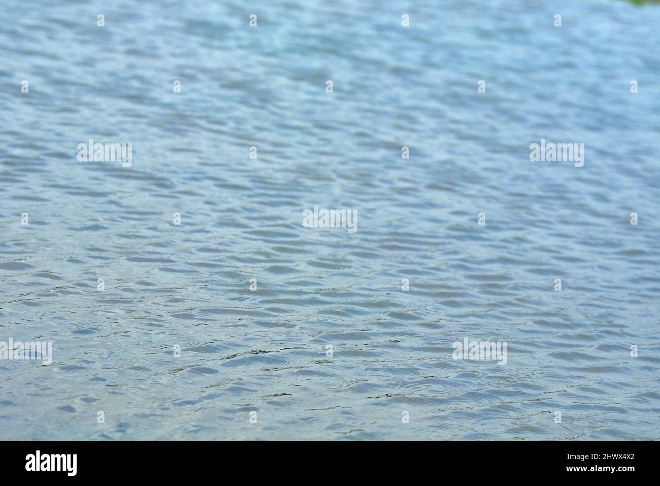 Blue sea waving water for background Stock Photo - Alamy