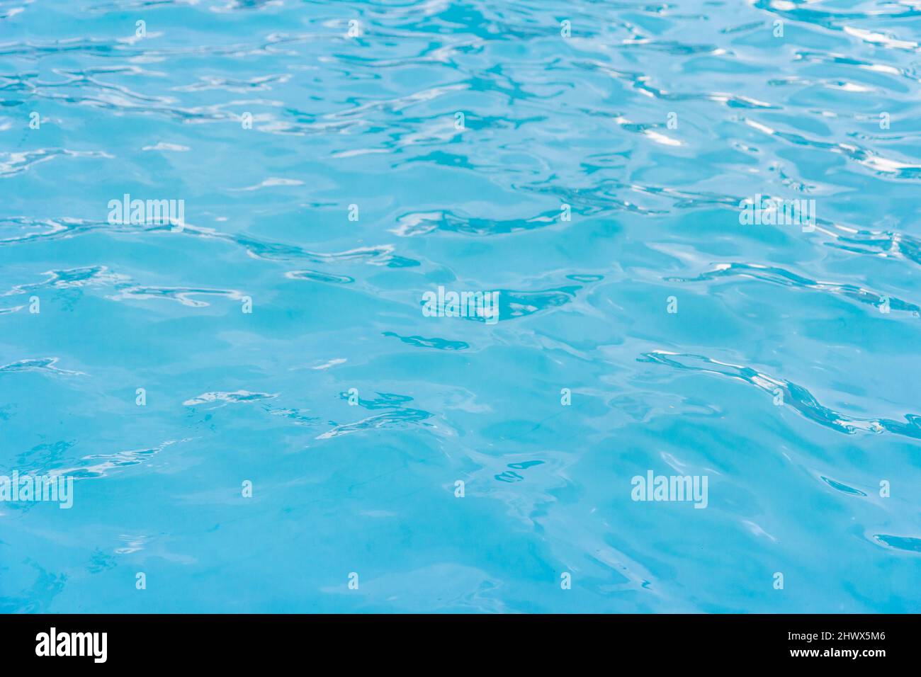Pool Blue water reflection texture background Stock Photo - Alamy