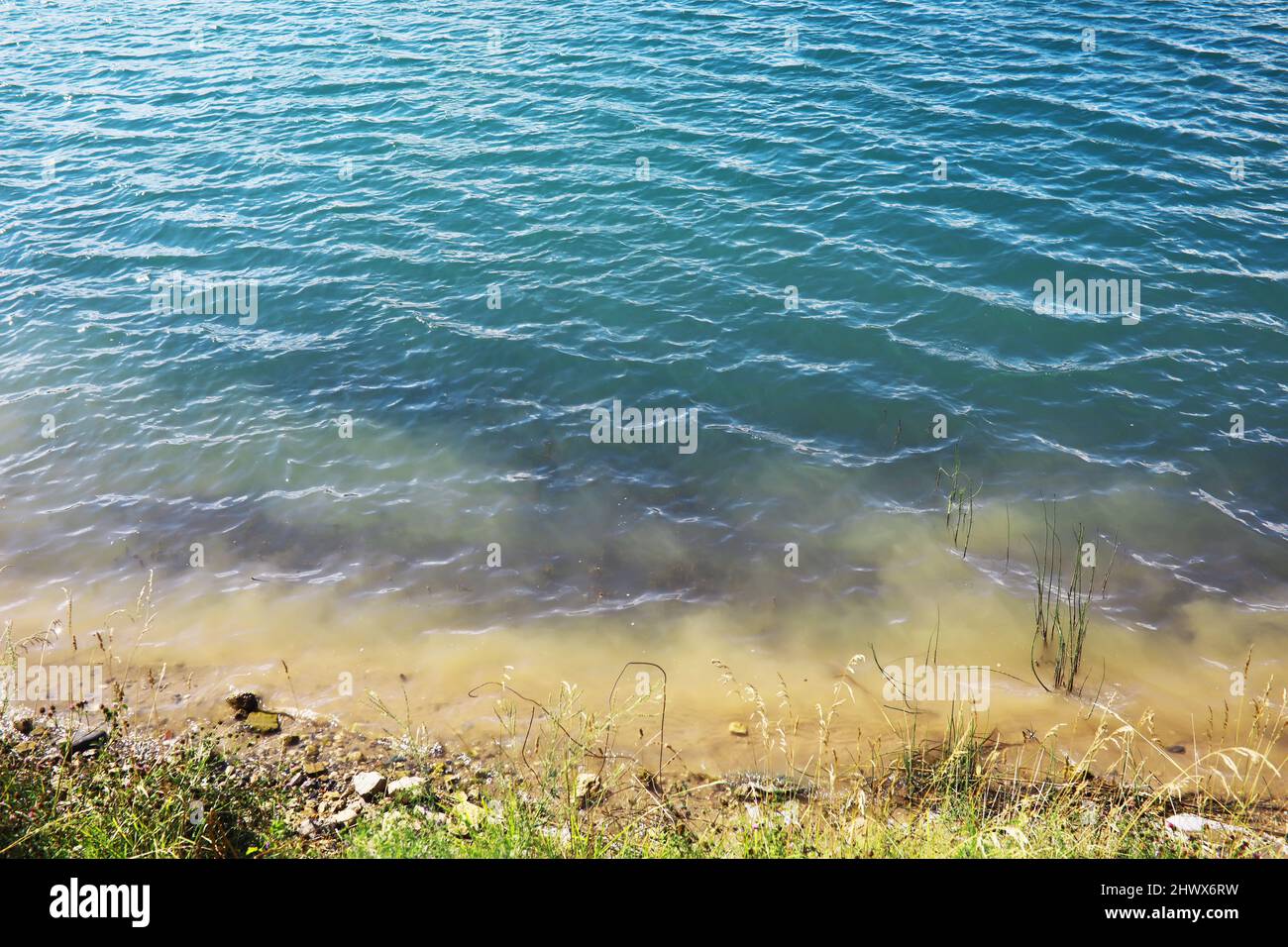 Water surface. The texture of the water. Waves on the lake windy ...