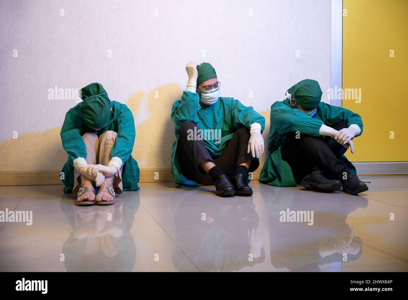 Tired doctor, Group of surgery doctors sadness fatigue after surgery ...