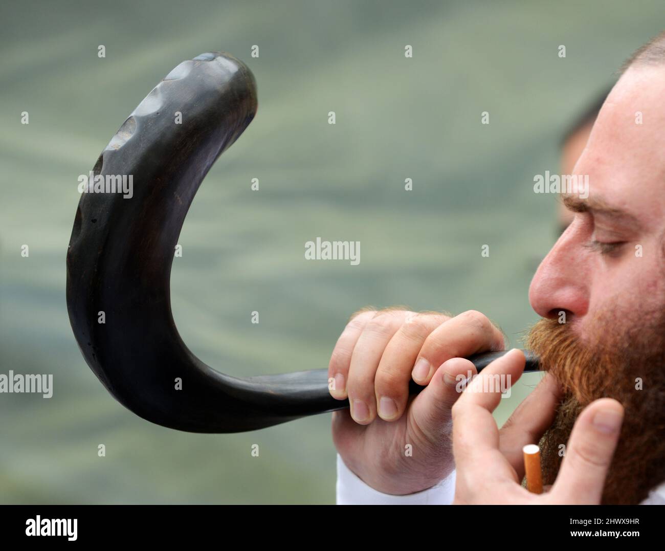 Blowing the shofar hi-res stock photography and images - Alamy