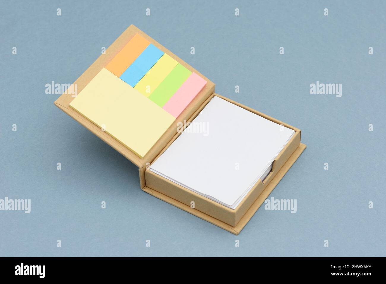 Cube note paper and stickers on the blue background Stock Photo - Alamy
