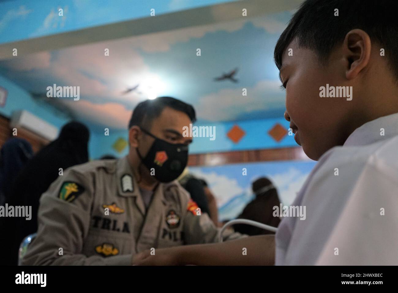 Makassar, Indonesia. 08th Mar, 2022. The Covid-19 vaccination for ...