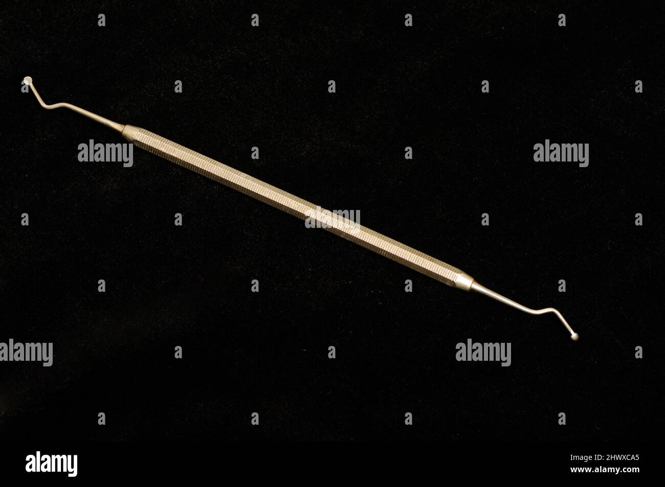 Double ended dental probe Stock Photo - Alamy