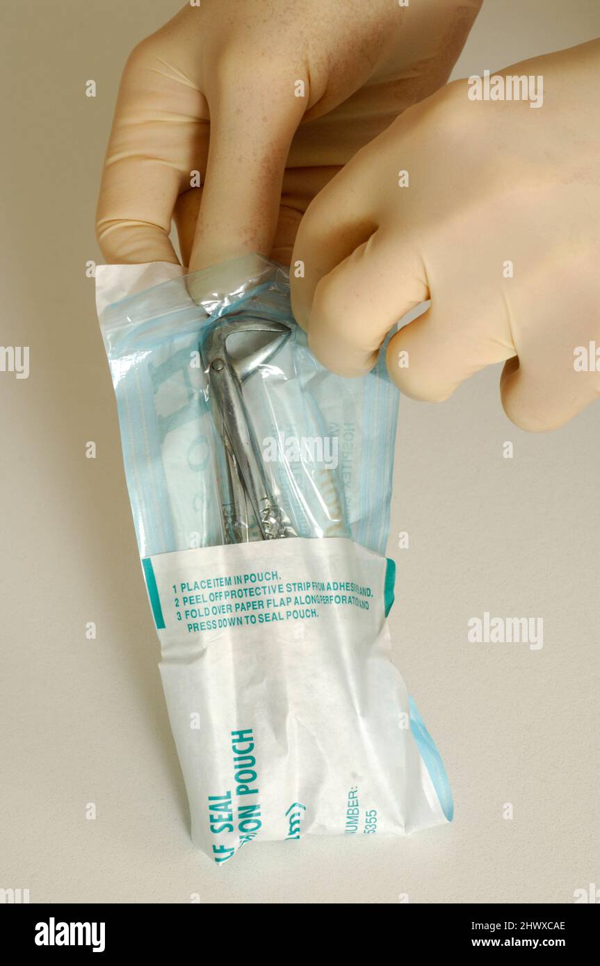 Opening package with teeth hi-res stock photography and images - Alamy