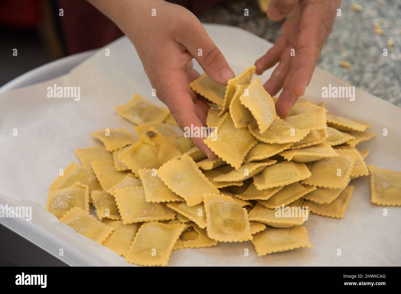 Chef preparing pasta Stock Photo - Alamy