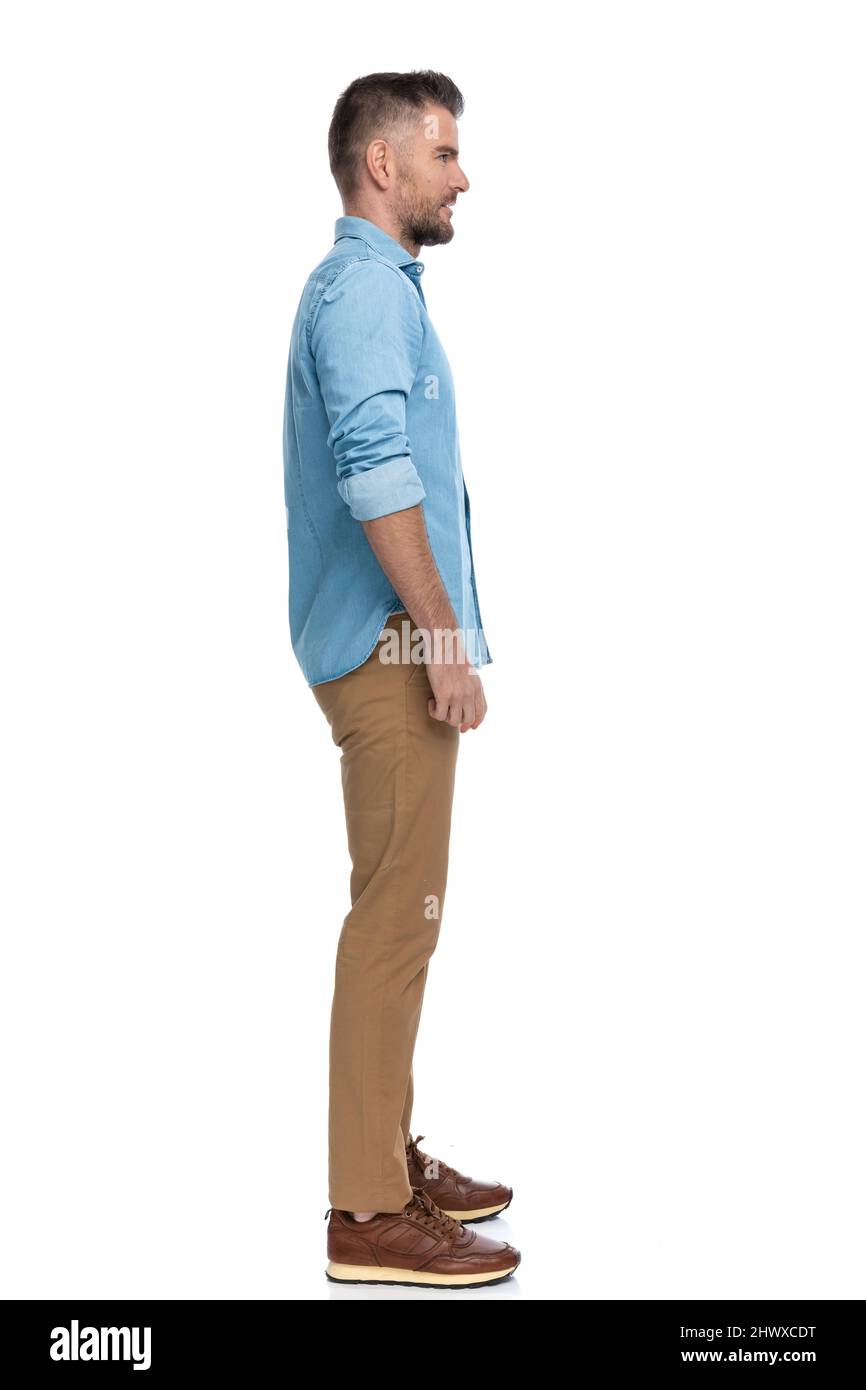 full body picture of middle aged man in a side view position wearing ...