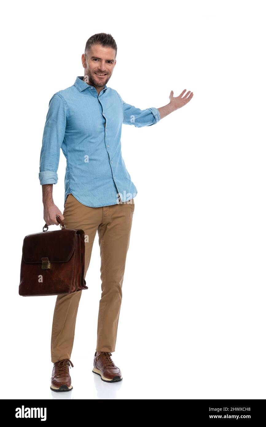 Smiling handsome man recommending Cut Out Stock Images & Pictures - Alamy