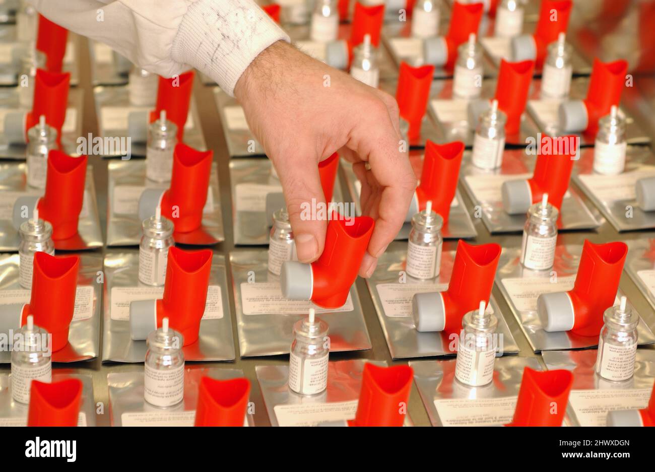 Asthma inhalers on the production line Stock Photo - Alamy
