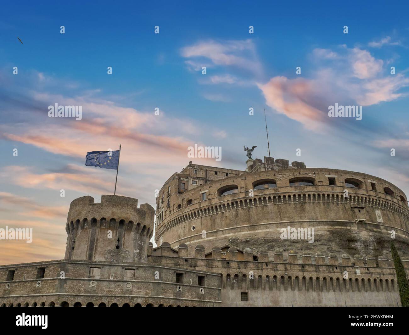 eu flag waving on castel sant angelo rome view Stock Photo - Alamy