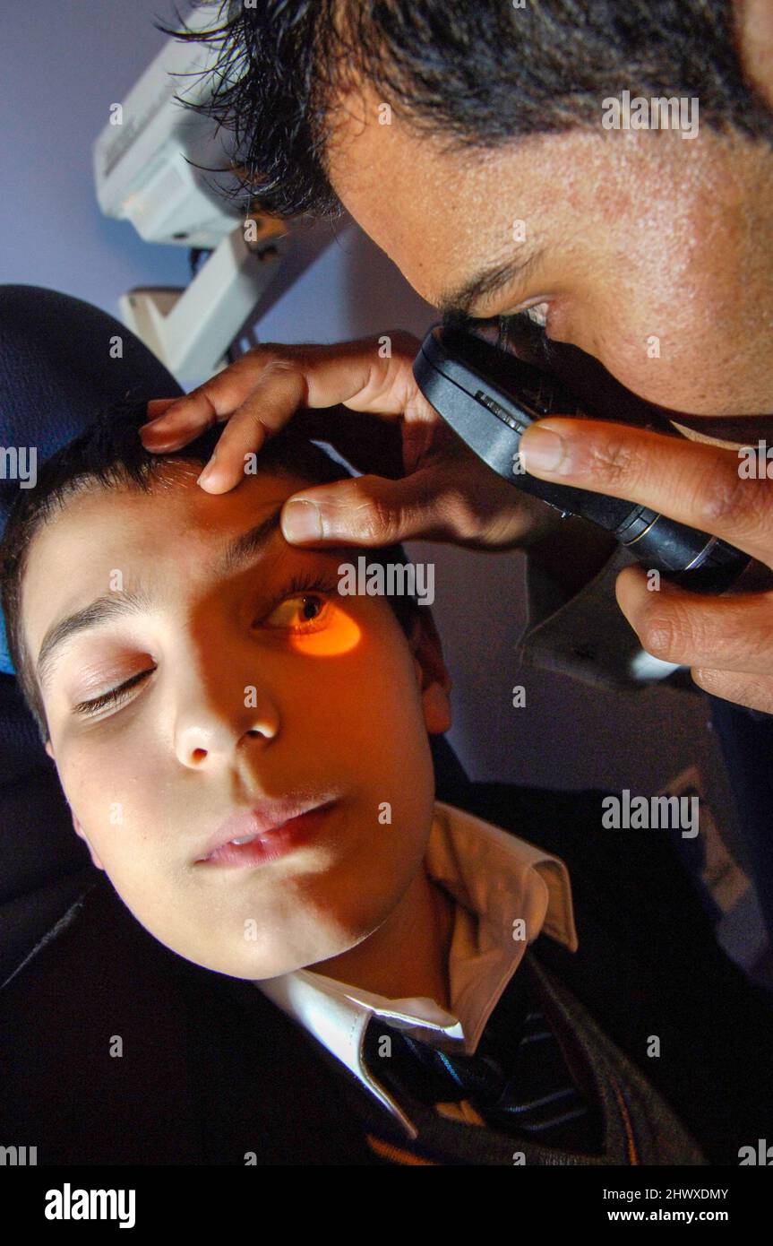 A patient undergoes an optometry exam during which the eye is ...