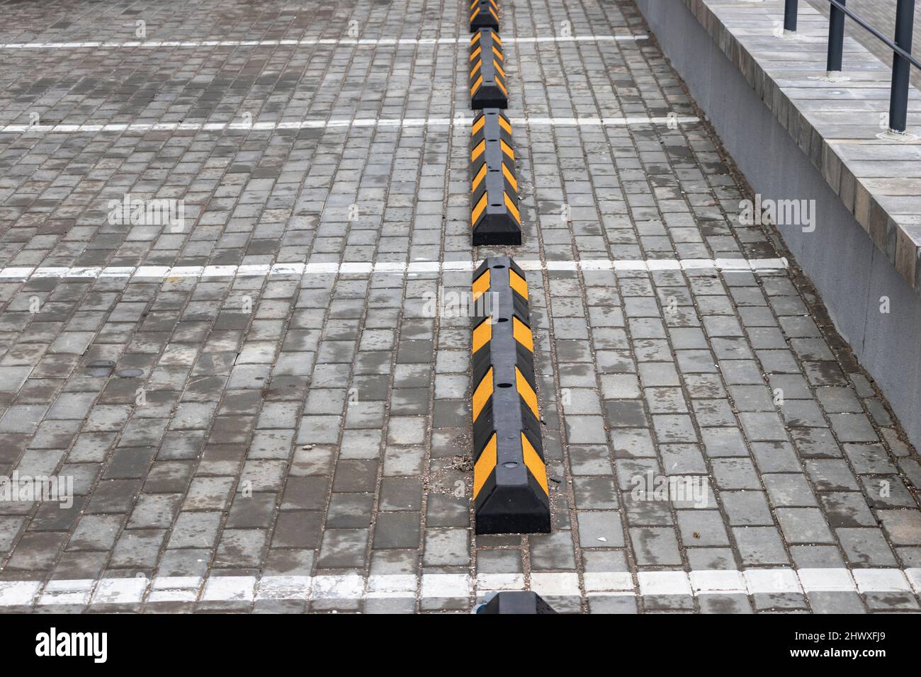 Concrete car stops hi-res stock photography and images - Alamy