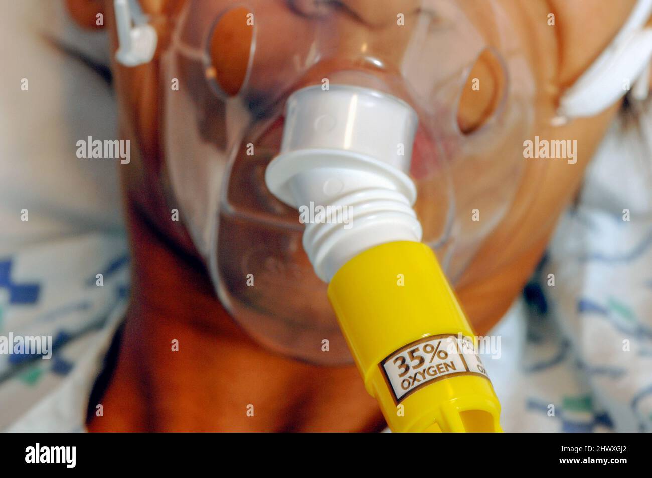 Close up of a young woman recovering from an operation with the help of ...