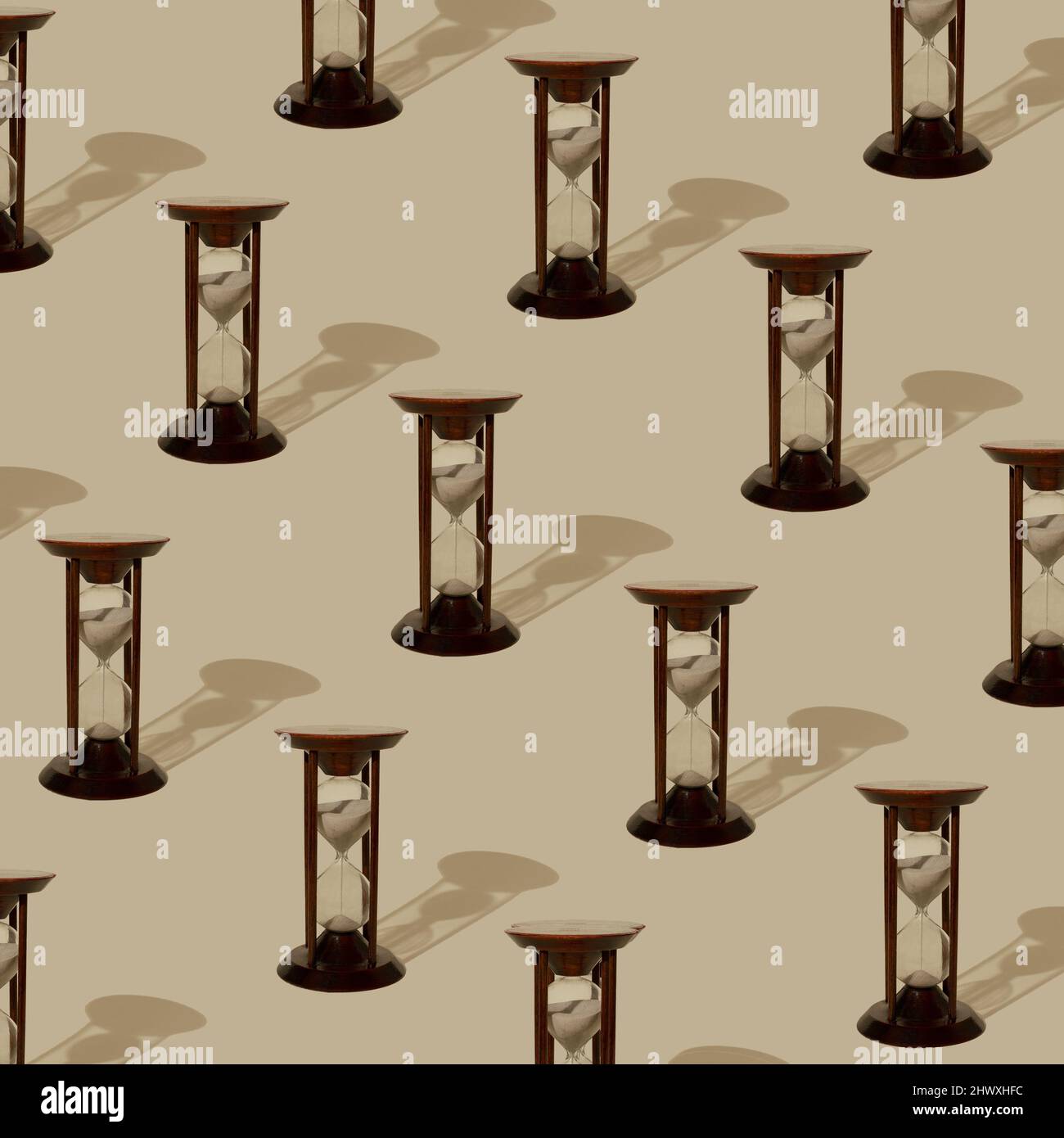 Vintage wooden sand clock pattern on golden minimal background Stock ...