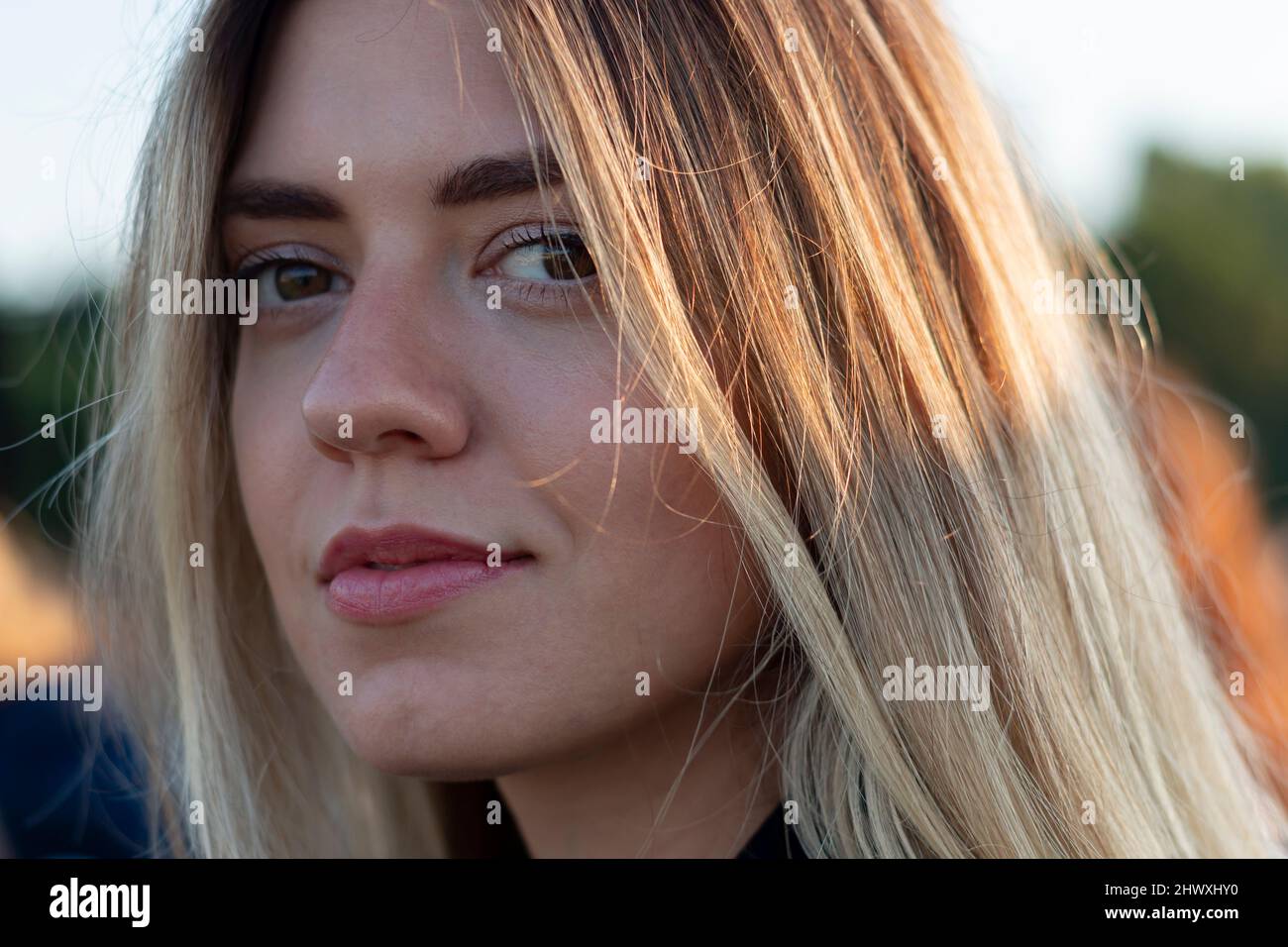 Portrait Of A Woman Close Up Photo She Looks Forward And Smiling