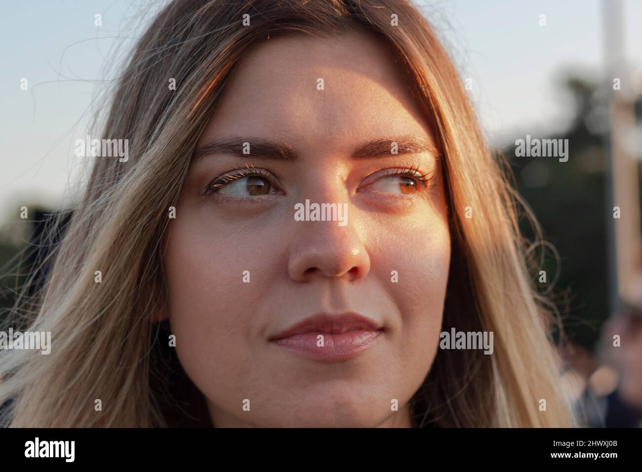 Portrait Of A Woman Close Up Photo She Looks Forward And Smiling