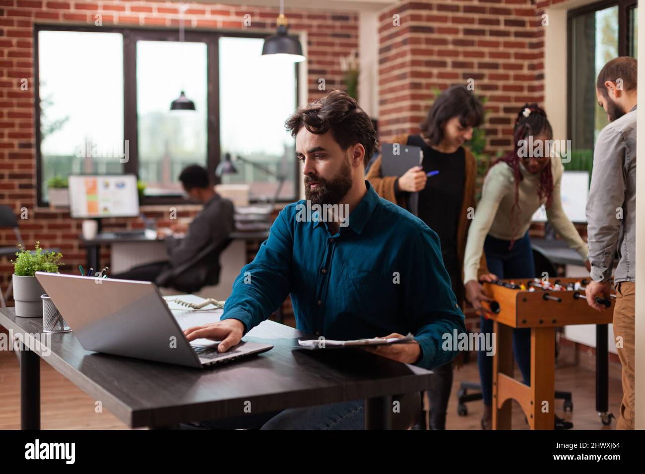 Busy businessman analyzing marketing statistics working at business ...