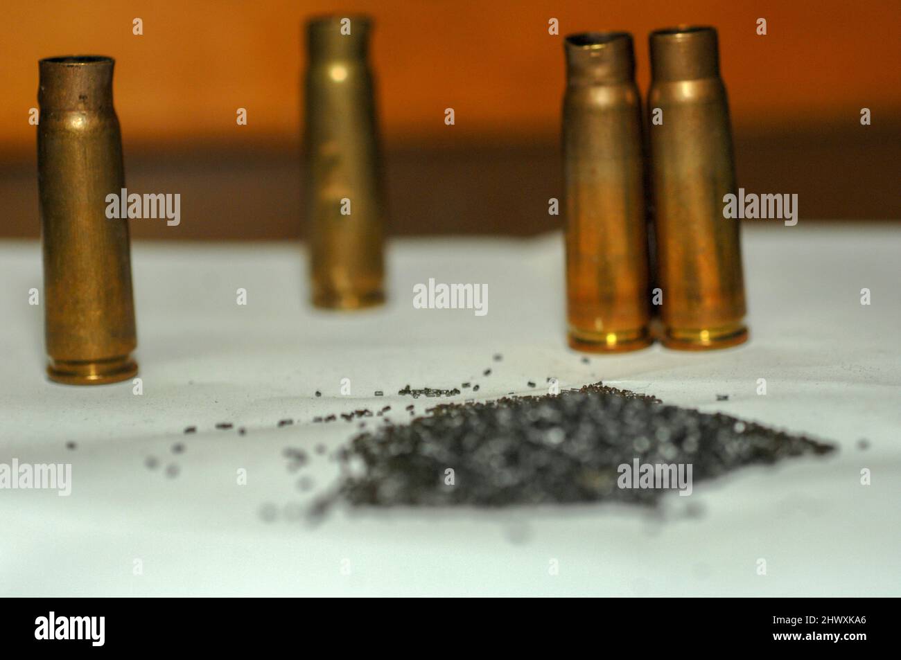 Gunpowder surrounded by bullet cartridge casings Stock Photo - Alamy