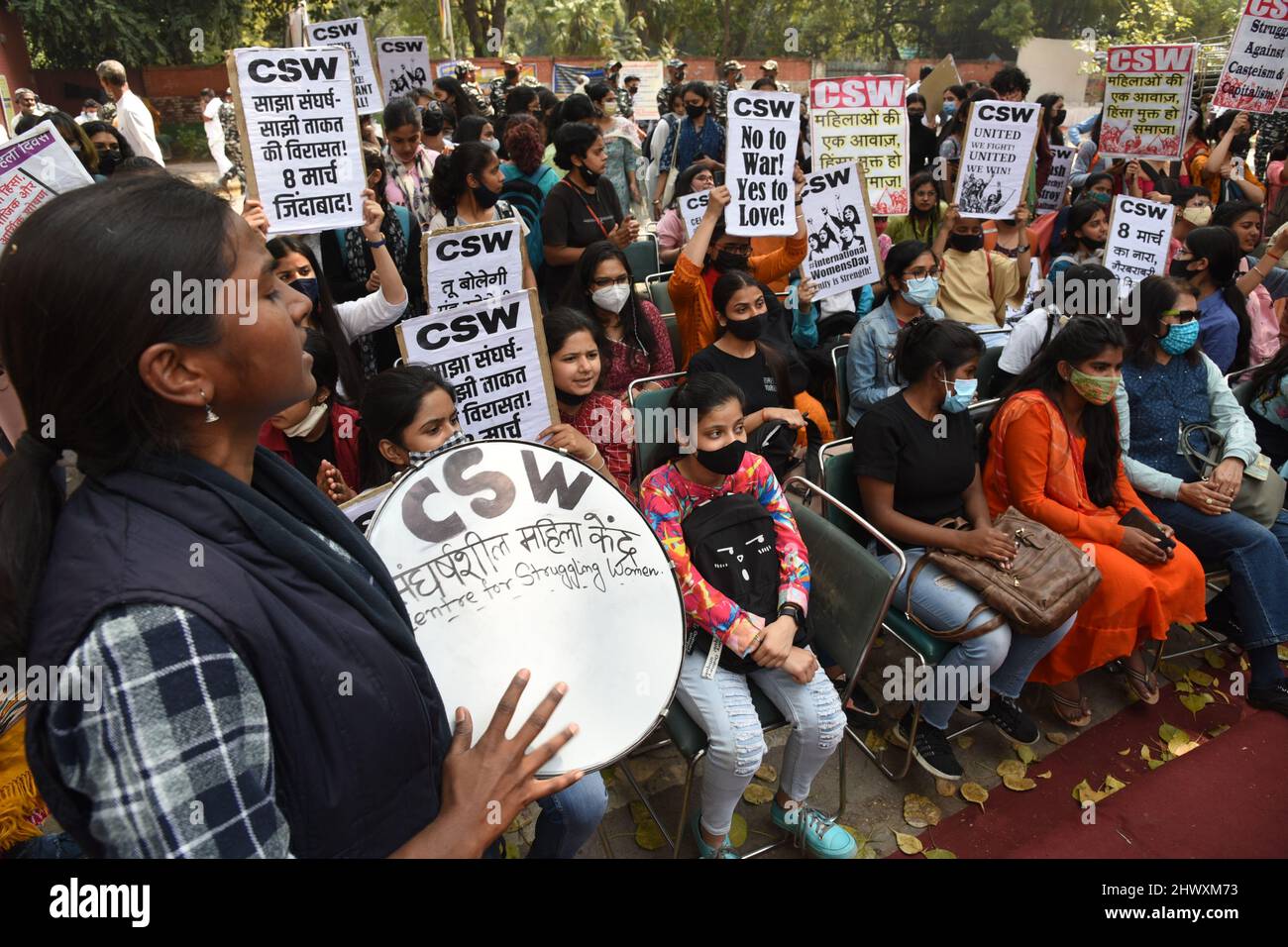 Women during a rally to demand gender equality, better working ...