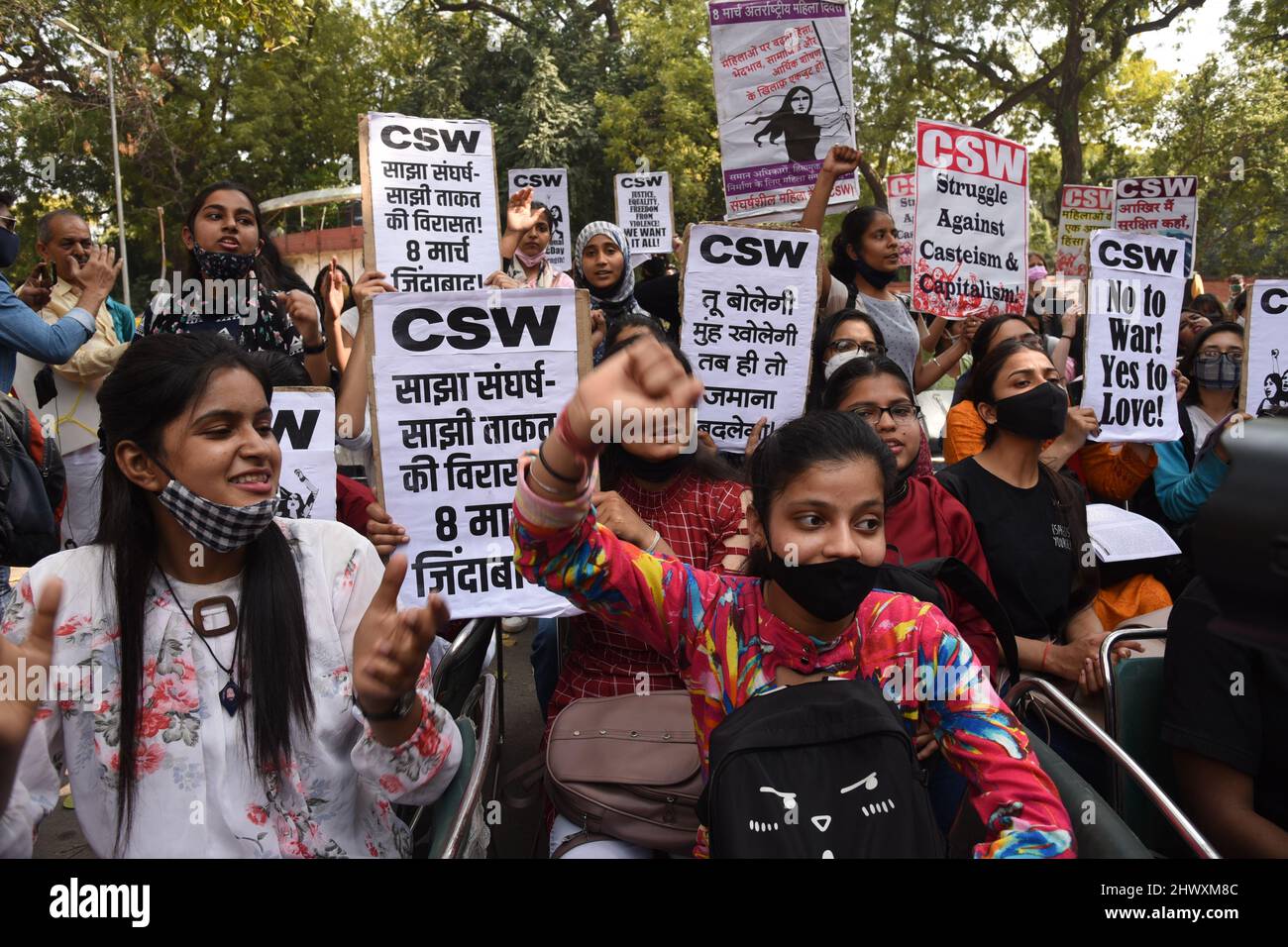 Women during a rally to demand gender equality, better working ...