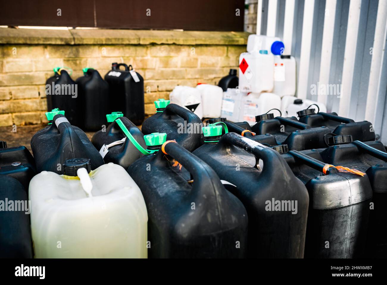 Plastic barrels containing hazardous chemicals from industry, waste ...