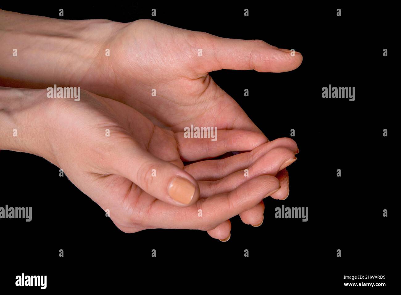 Raised cupped hands hi-res stock photography and images - Alamy