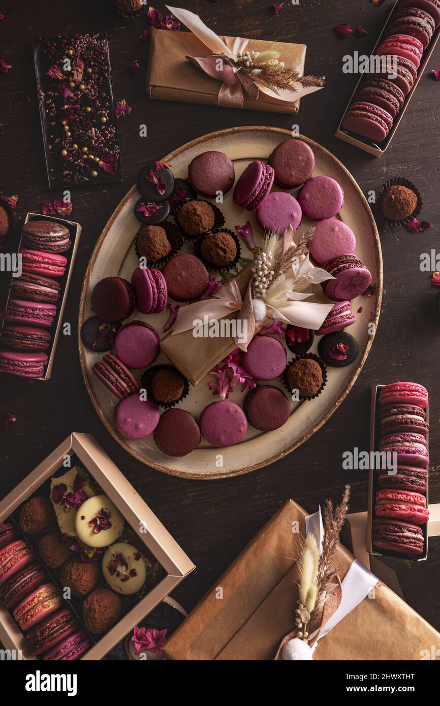 French macaron cakes in a plate and in a gift box Stock Photo - Alamy