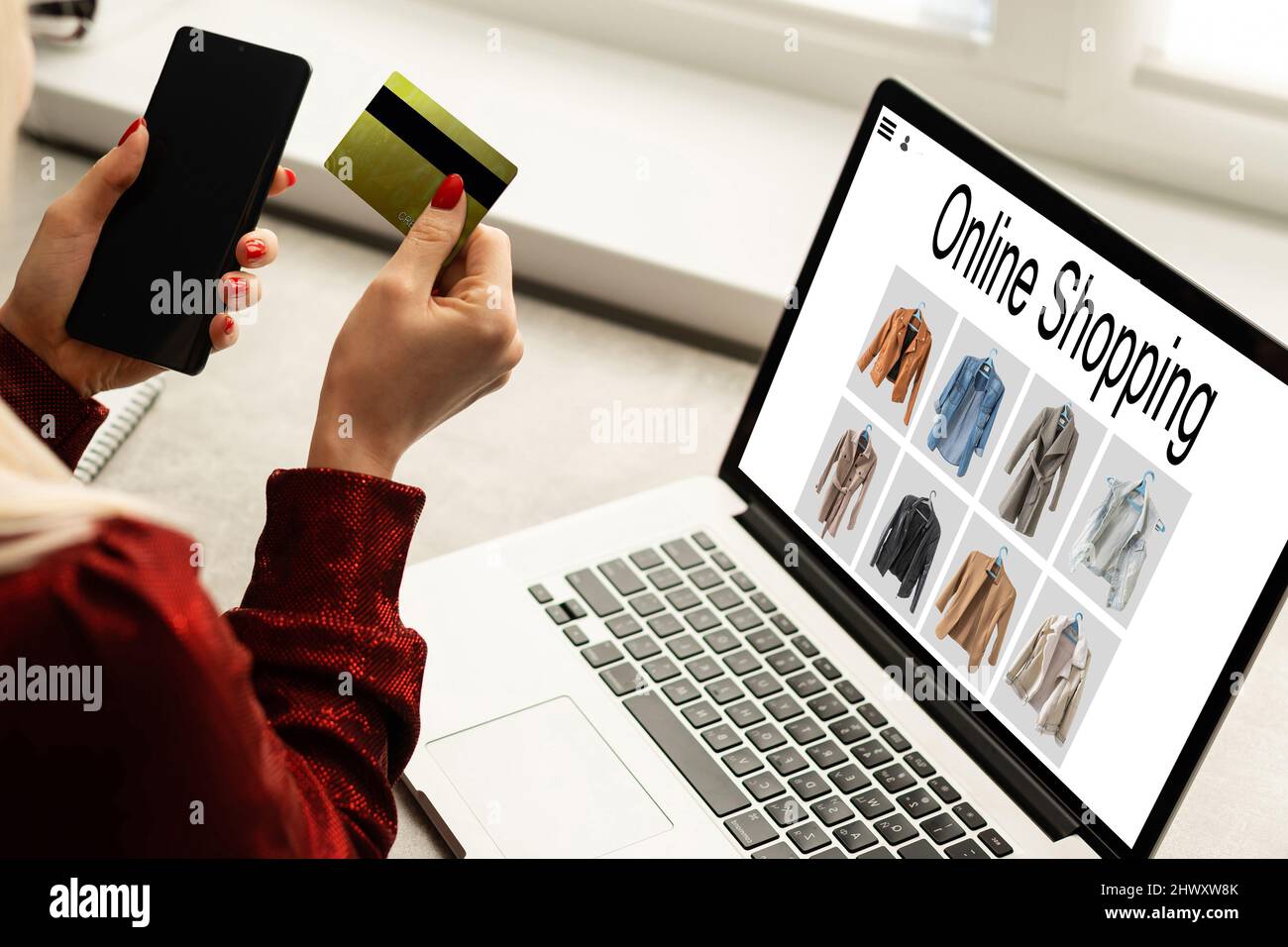 shopping, technology and internet concept: shopping with laptop ...