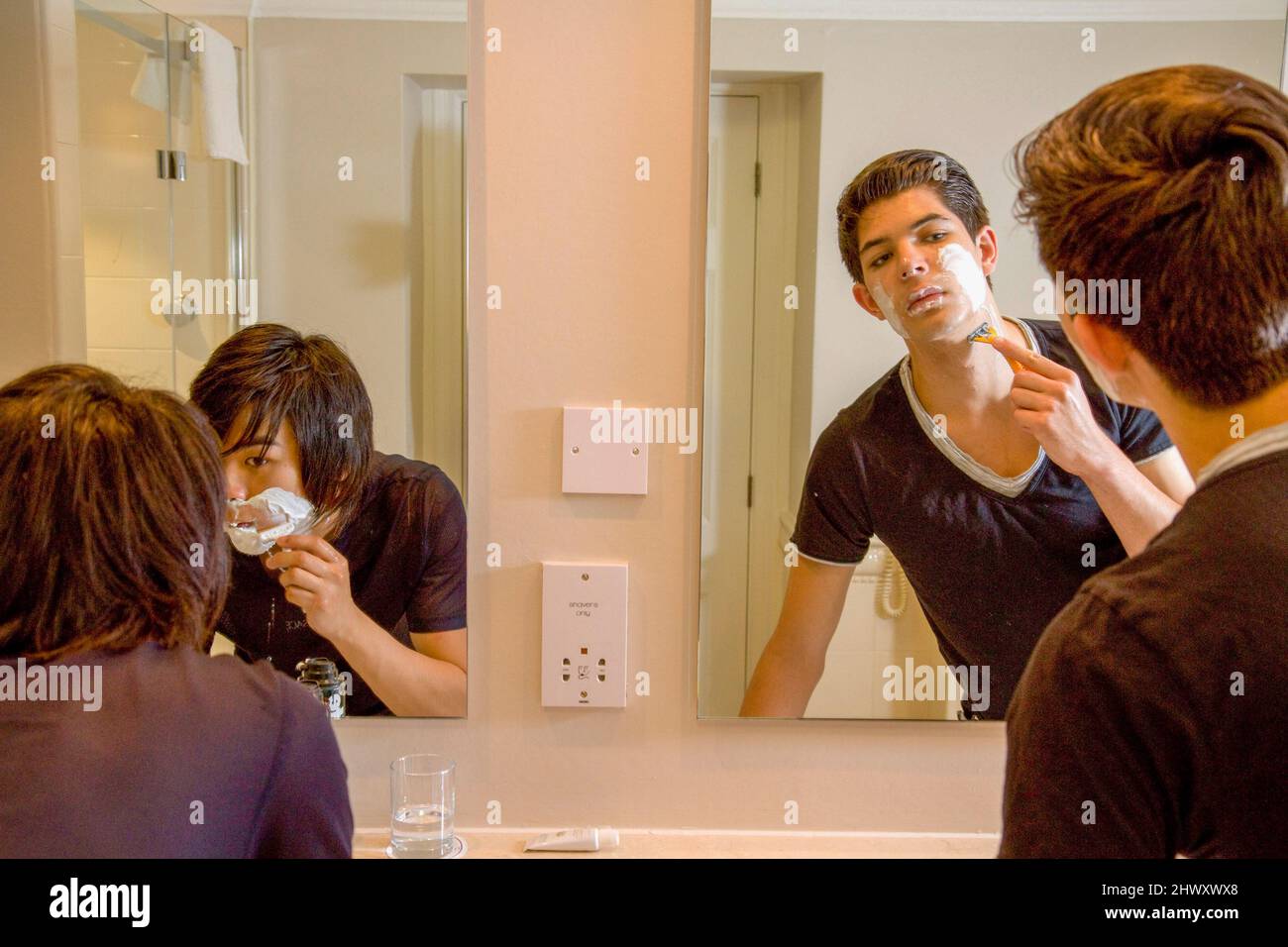 The picutre shows two young men shaving. (MODEL RELEASED Stock Photo ...