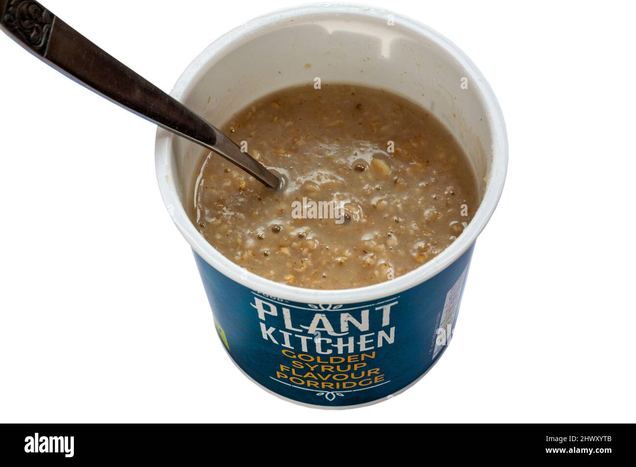 eating pot of Plant Kitchen Golden Syrup Flavour Porridge from M&S on ...