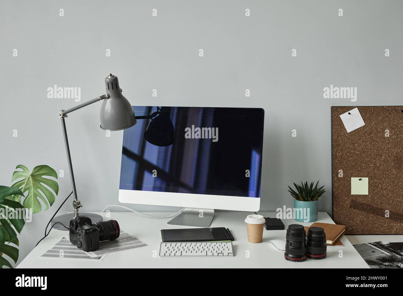 Minimal background image of photographers workplace with computer setup ...