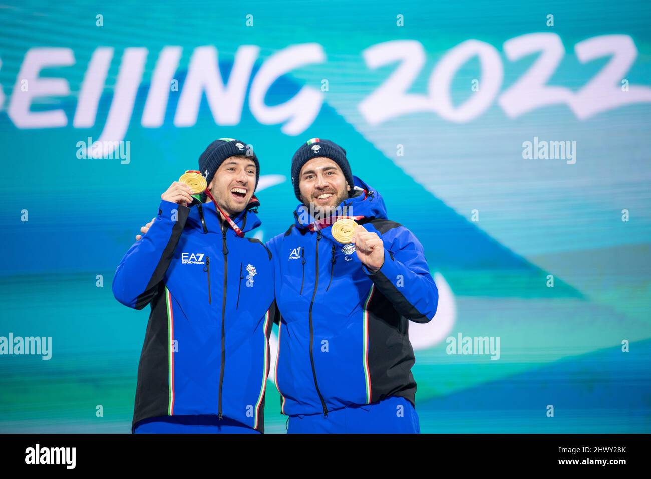 Beijing, China. 8th Mar, 2022. Gold medalist Giacomo Bertagnolli (L ...