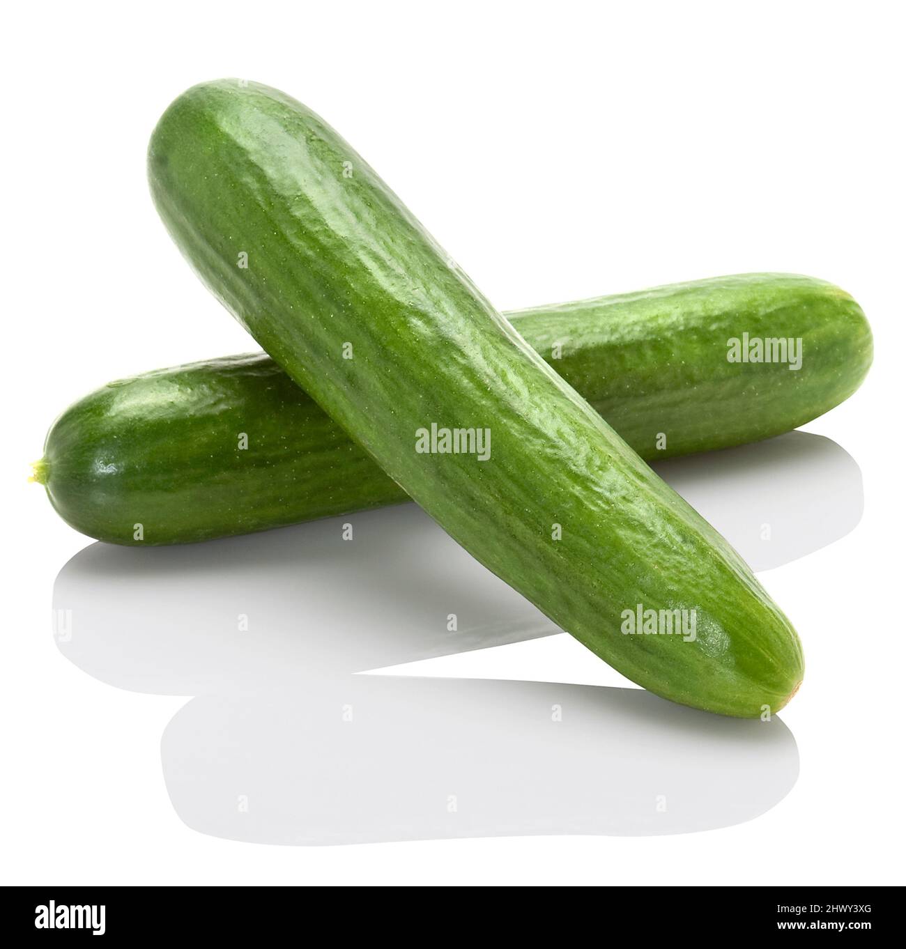 2 cucumbers isolated on a white background Stock Photo - Alamy
