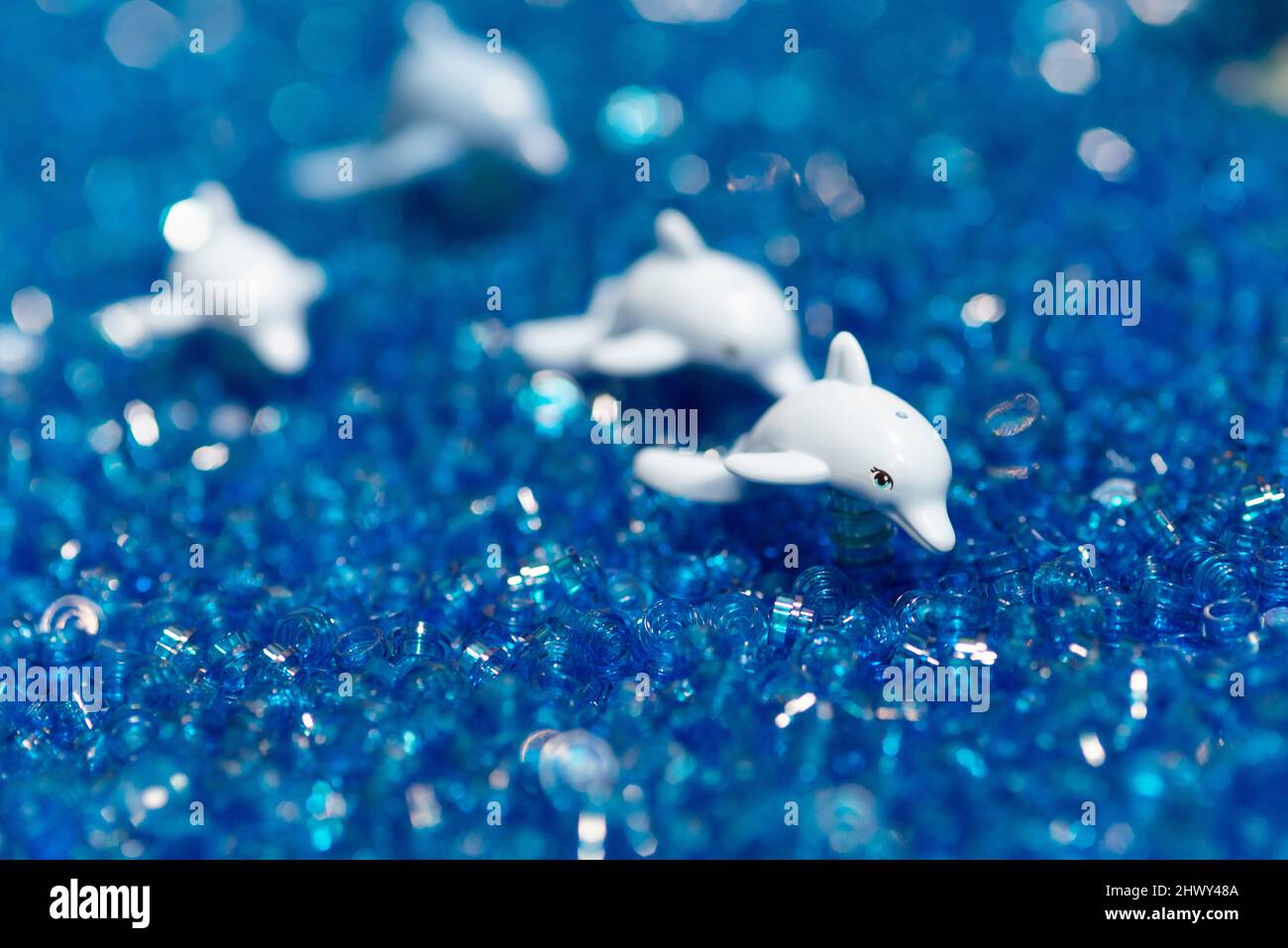 Group of Lego Dolphins Minifigures in the Sea Stock Photo - Alamy