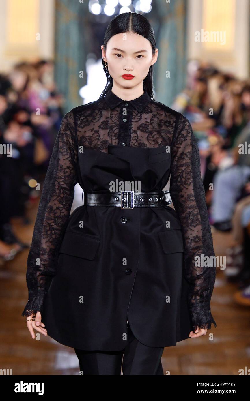 Model He Cong walks on the runway at the Sacai fashion show during Fall ...