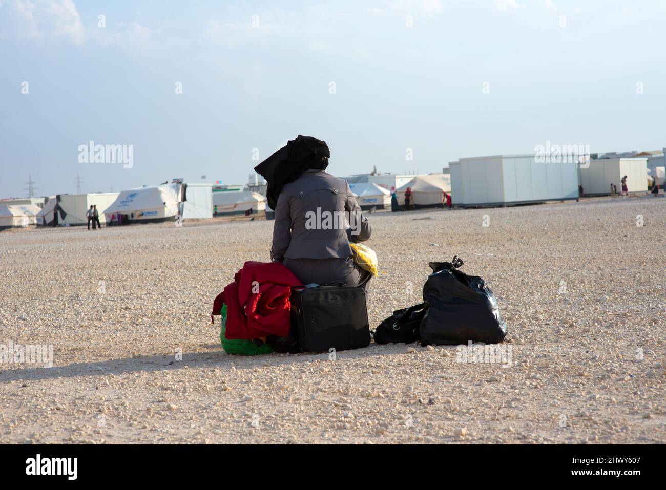 Al Za'atari, Al Mafraq, Jordan. Female Syrian War Refugee sitting on ...