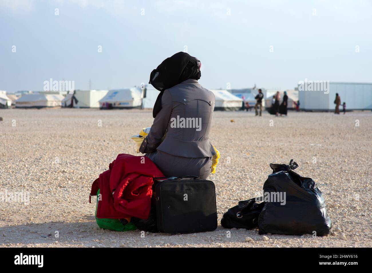 Al Za'atari, Al Mafraq, Jordan. Female Syrian War Refugee sitting on ...