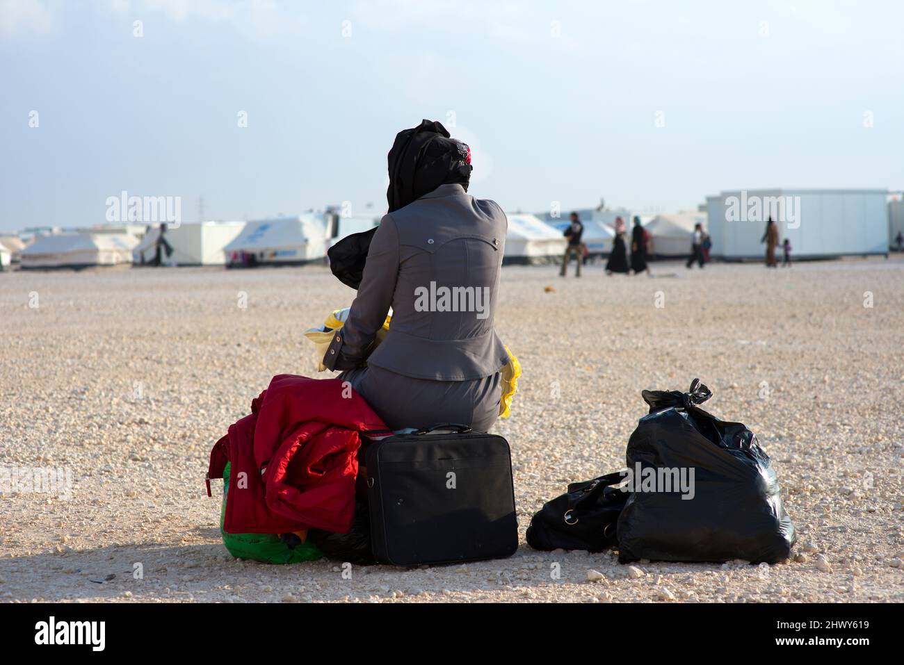 Al Za'atari, Al Mafraq, Jordan. Female Syrian War Refugee sitting on ...
