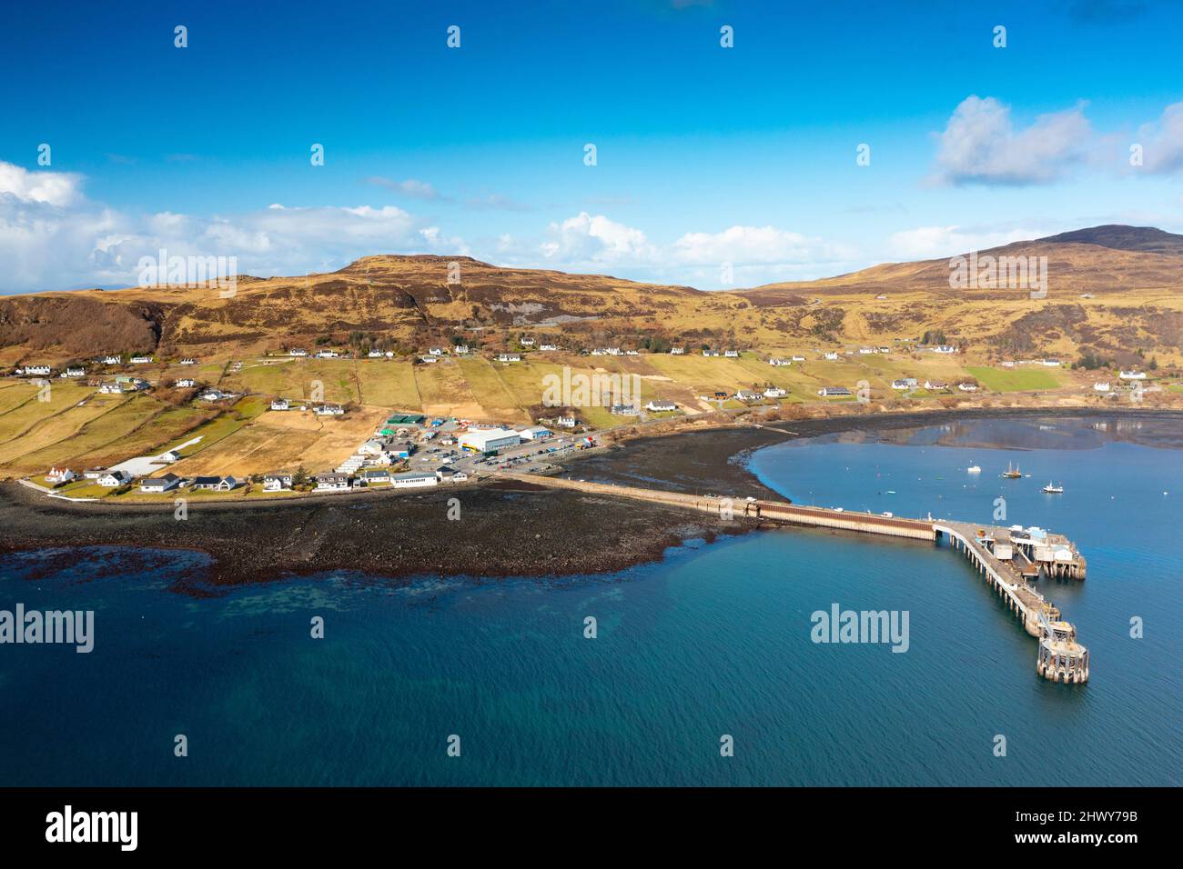 Aerial view from drone of village and ferry terminal at Uig on the Isle ...
