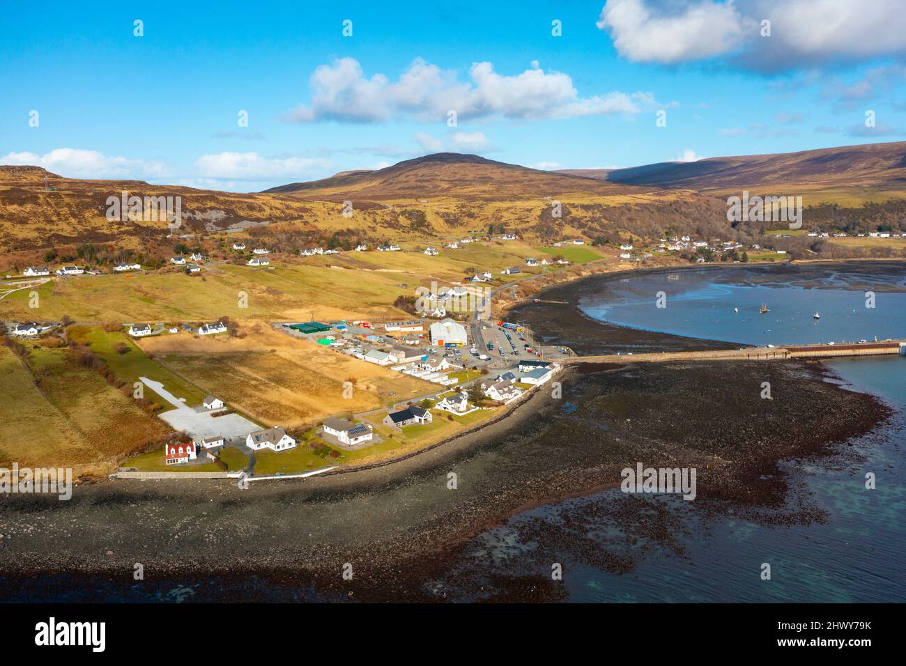 Aerial view from drone of village and ferry terminal at Uig on the Isle ...