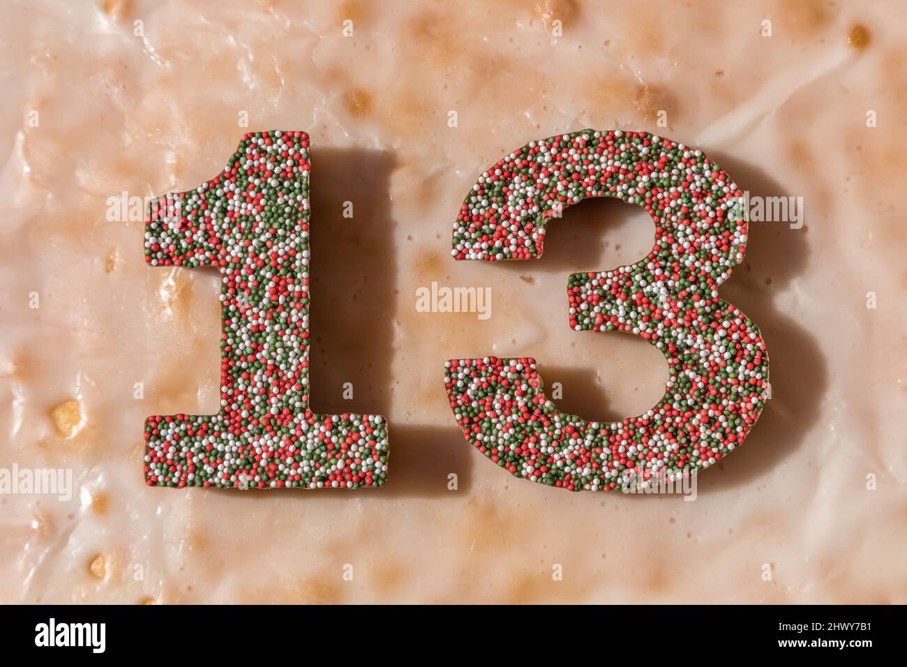the number 13 on a birthday cake Stock Photo - Alamy