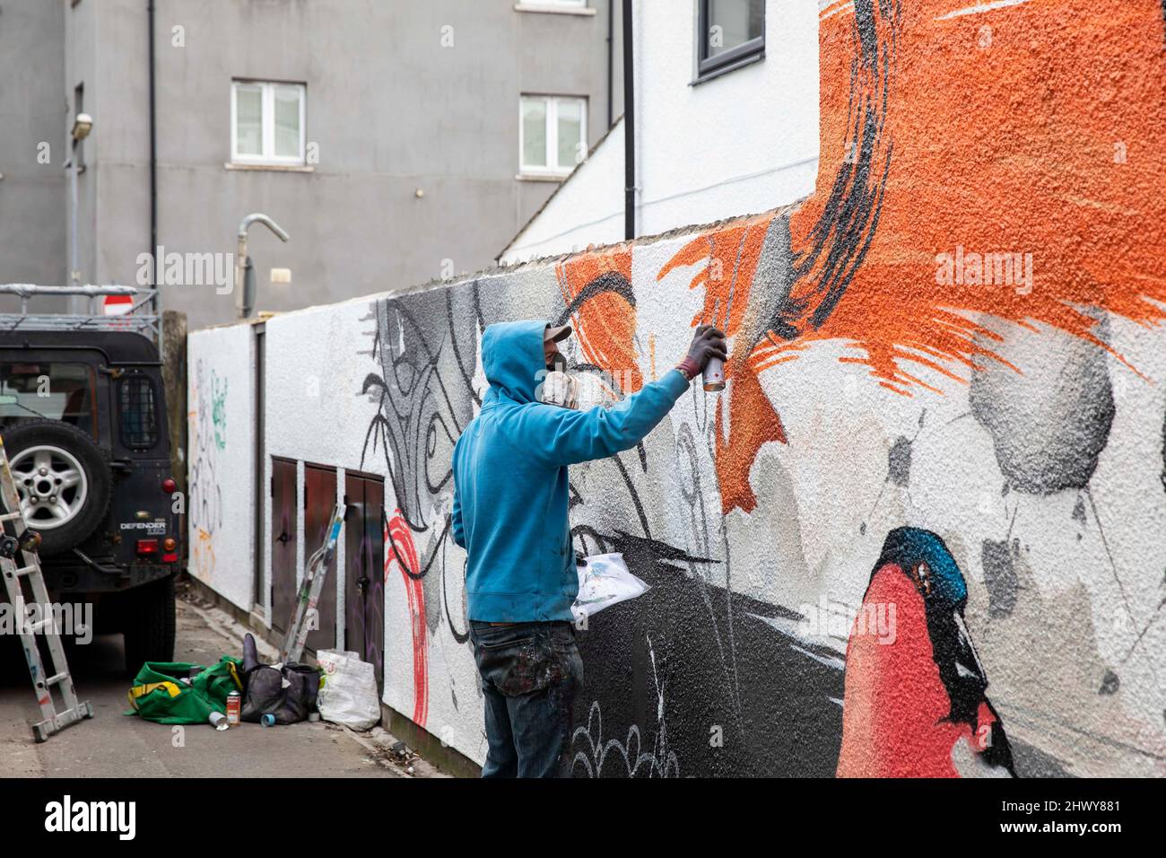 Graffiti and tattoo artist Bryce Davies, aka Peaceful Protest, working ...